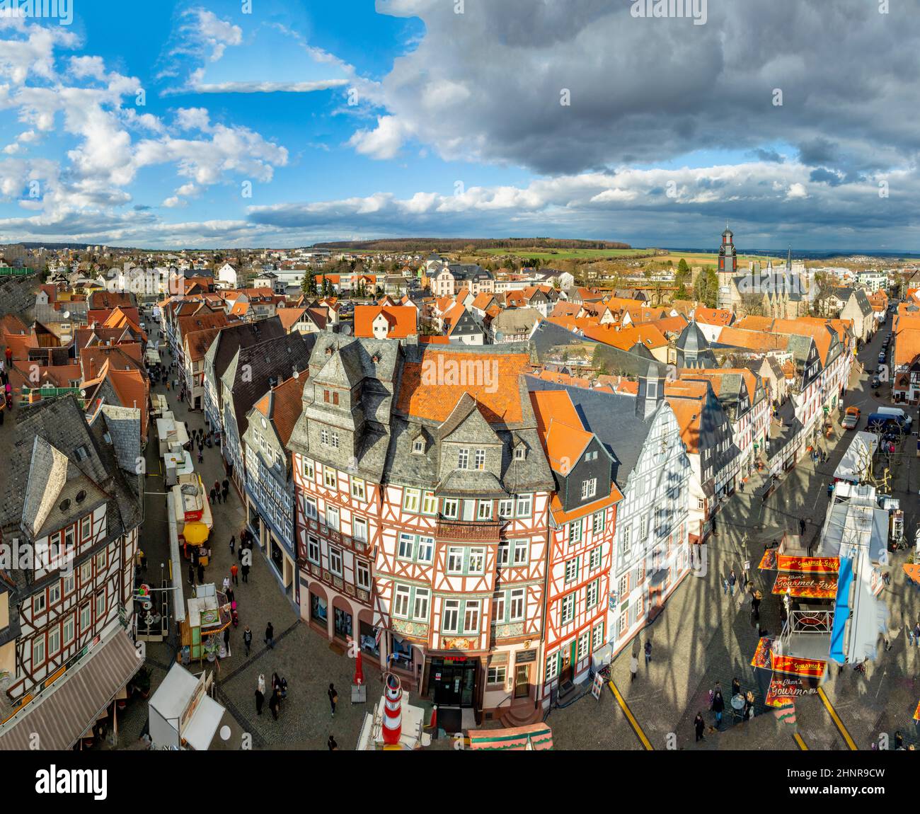 half timbered houses in Butzbach, Germany and people visiting the Fasel ...