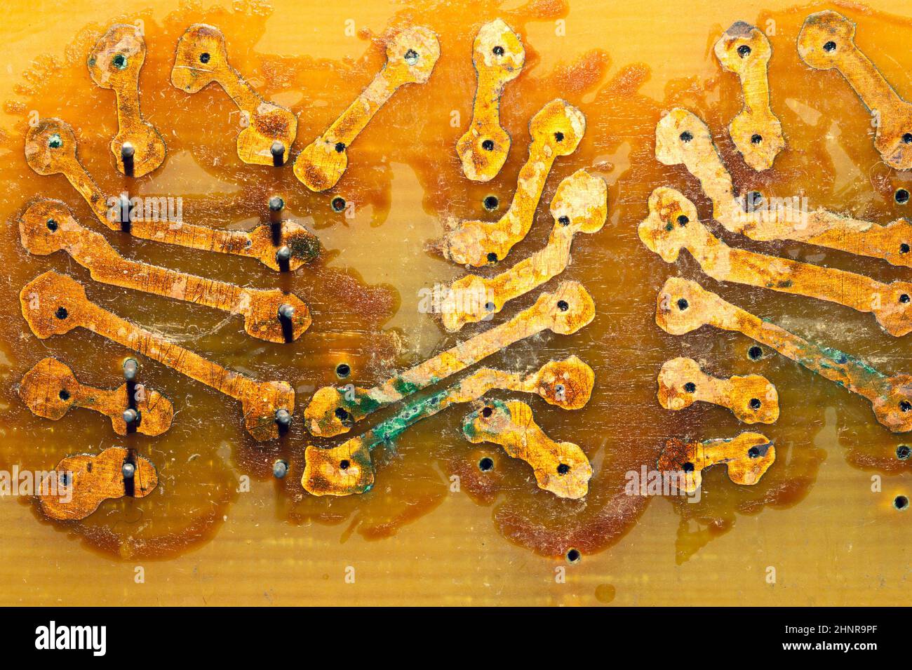 Handmade circuit board with copper tracks. industrial background. radio ...