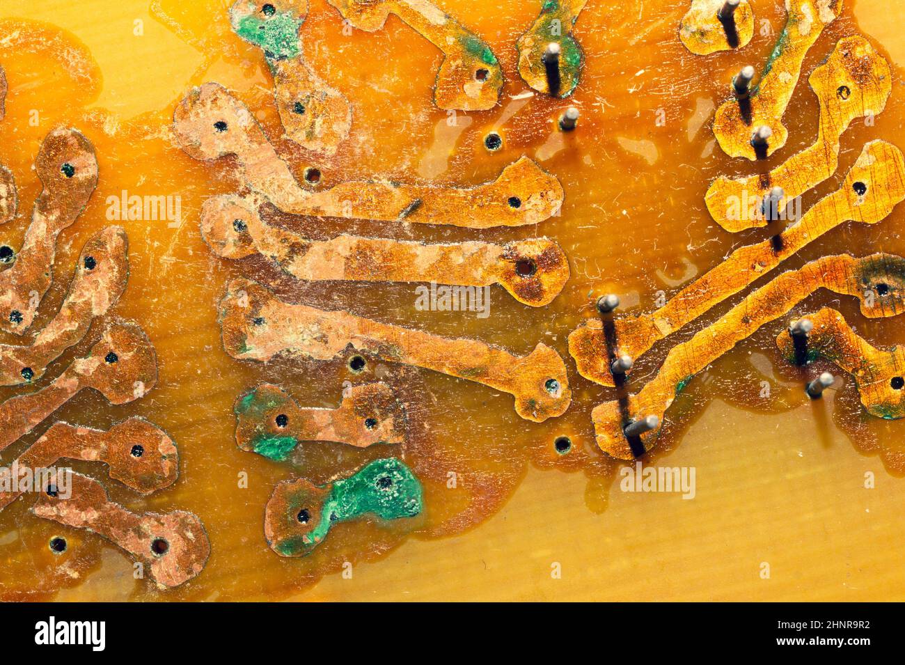 Handmade circuit board with copper tracks. industrial background. radio ...