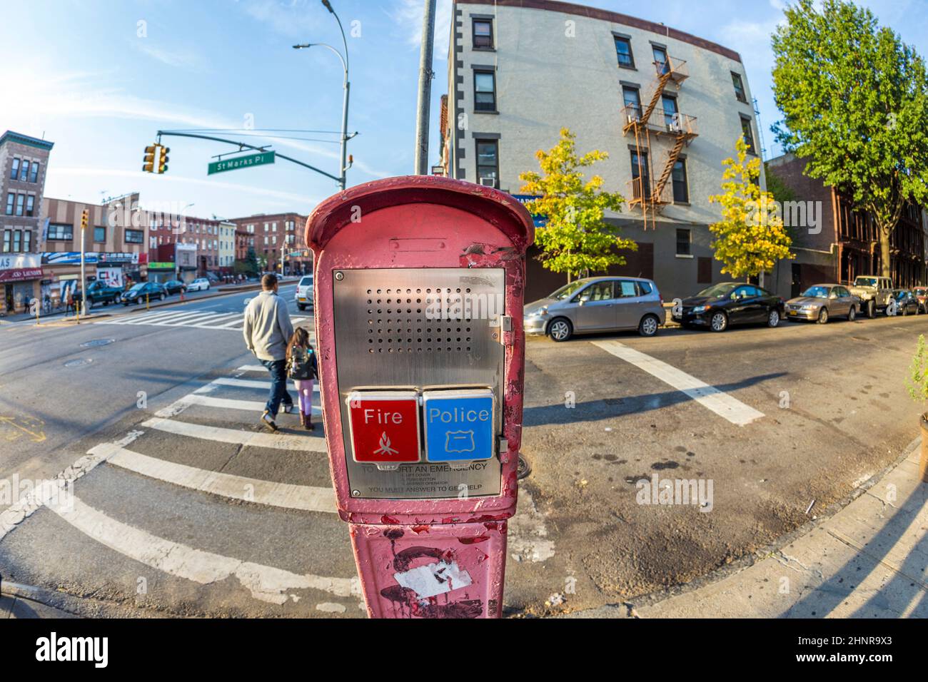 typical street scene with emergency call phone in early morning in New ...