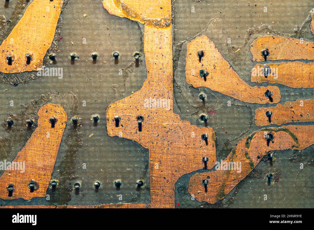 Handmade circuit board with soldered copper tracks. industrial ...