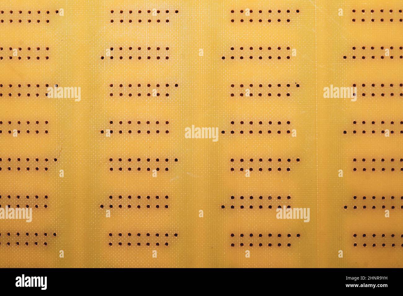 Dotted textolite surface. template for soldering the circuit ...