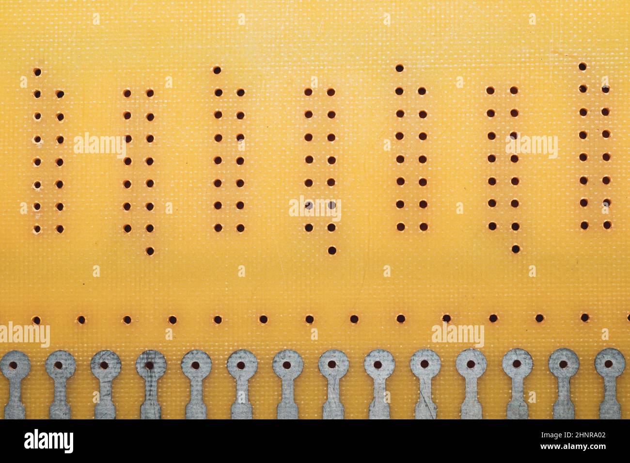 Dotted textolite surface. template for soldering the circuit ...