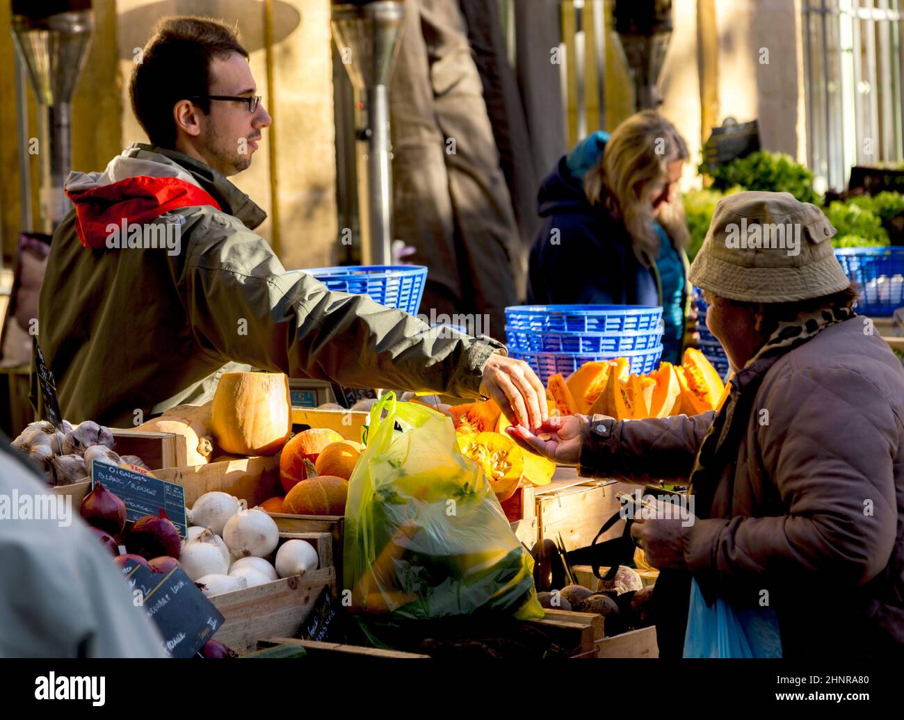 local people buy fresh vegetables and fruits at the local market in Aix ...