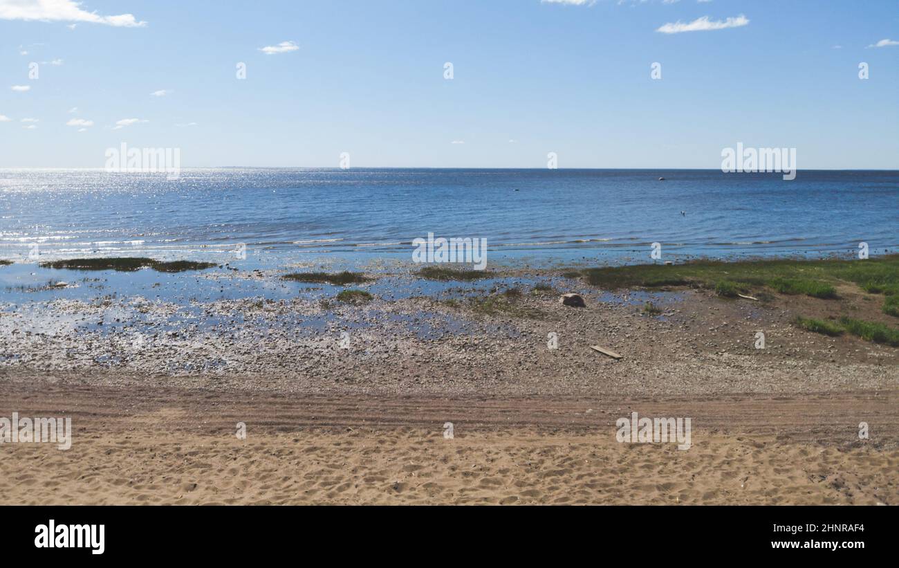 Shore of the sea. seascape with horizon line. silt coast. water surface ...