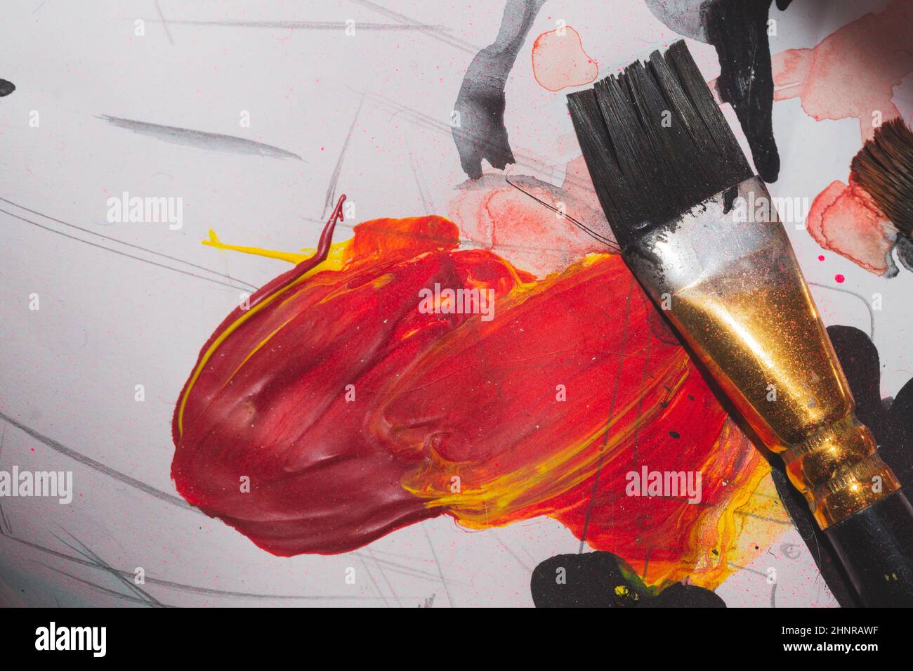 Paintbrush close up. drawing process. paint spots on the paper Stock ...