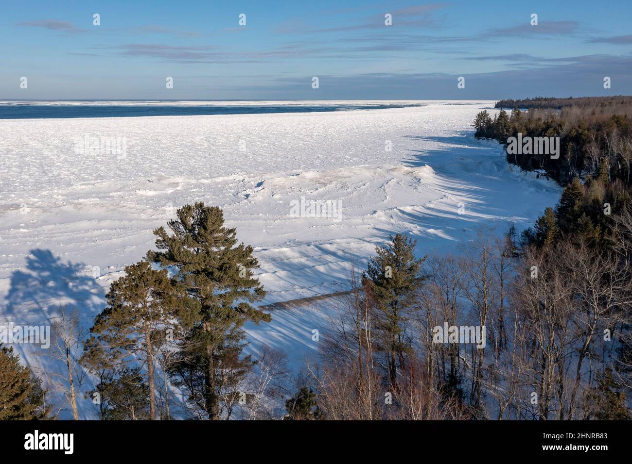 Au Train, Michigan - Lake Superior in winter, partially frozen and snow ...