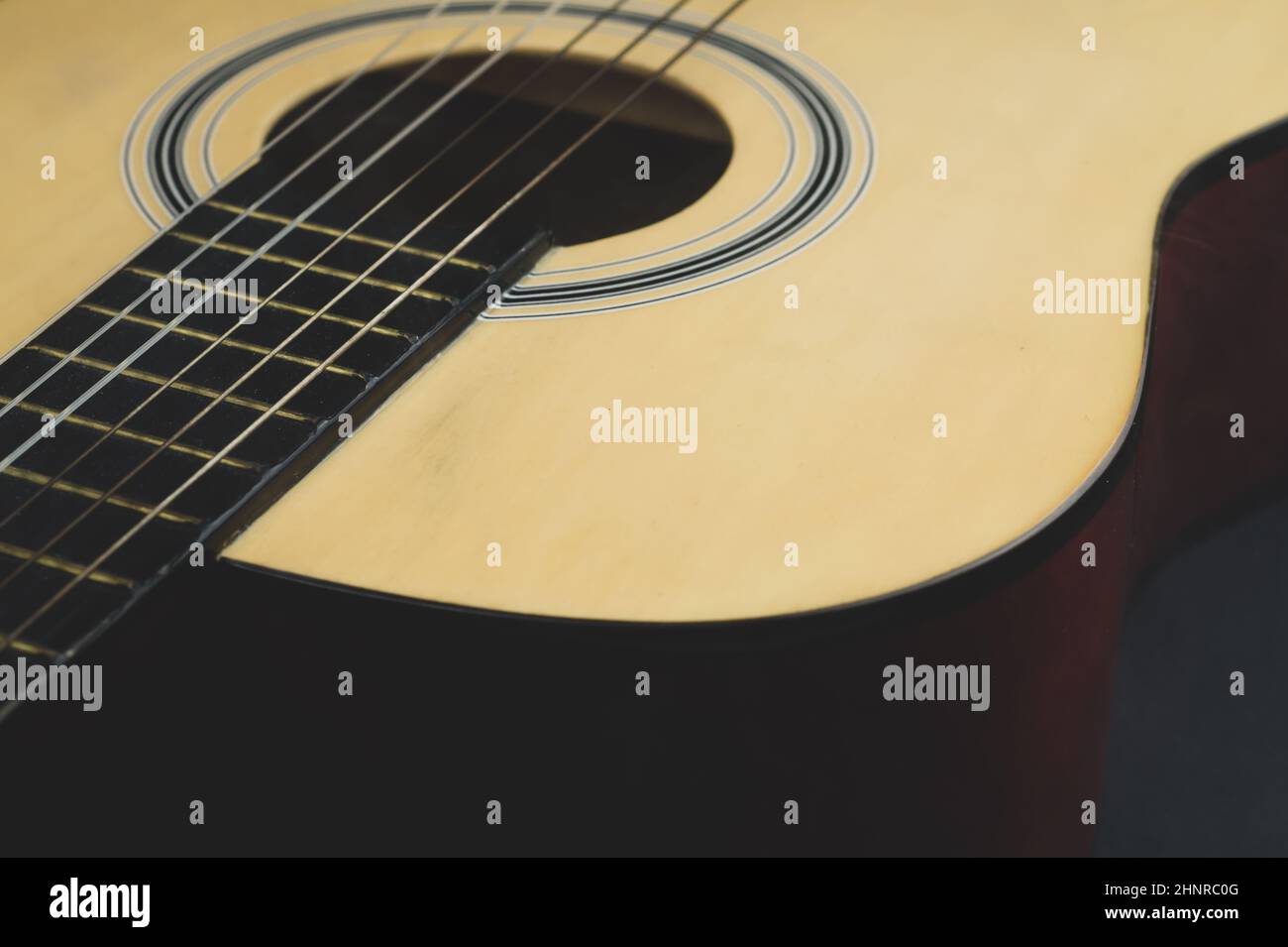 Acoustic guitar close up. musical instrument. strings on the guitar ...