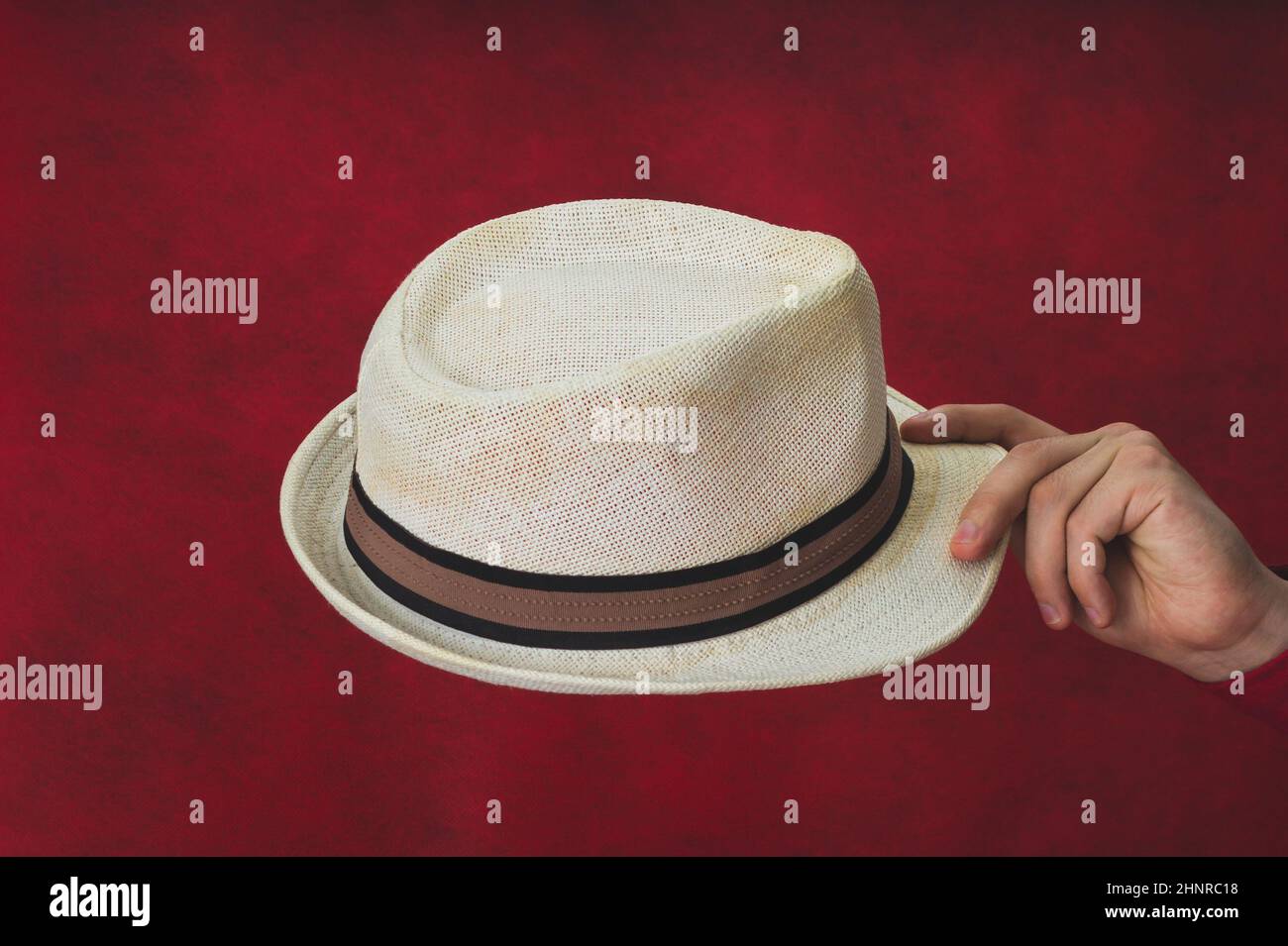 Male hand holding cowboy hat hi-res stock photography and images - Alamy