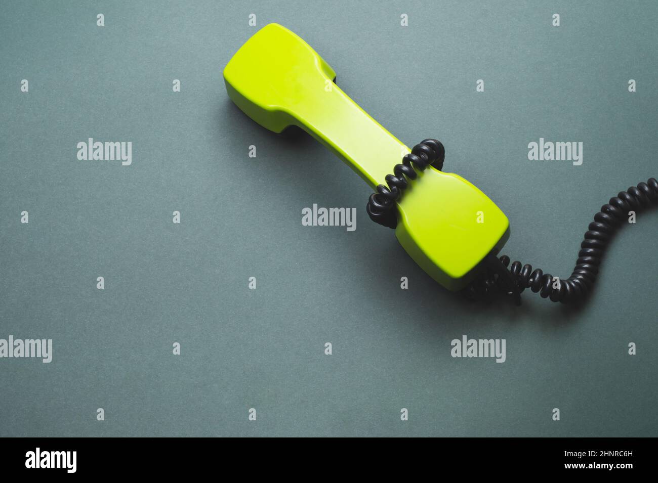 Vintage green telephone handset. phone receiver isolated on color ...