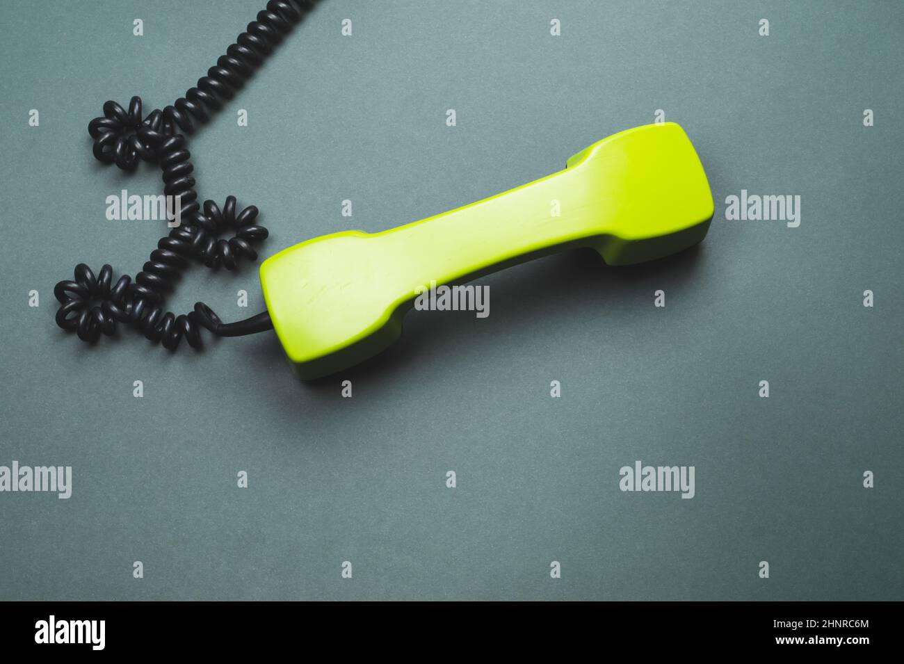 Vintage green telephone handset. phone receiver isolated on color ...