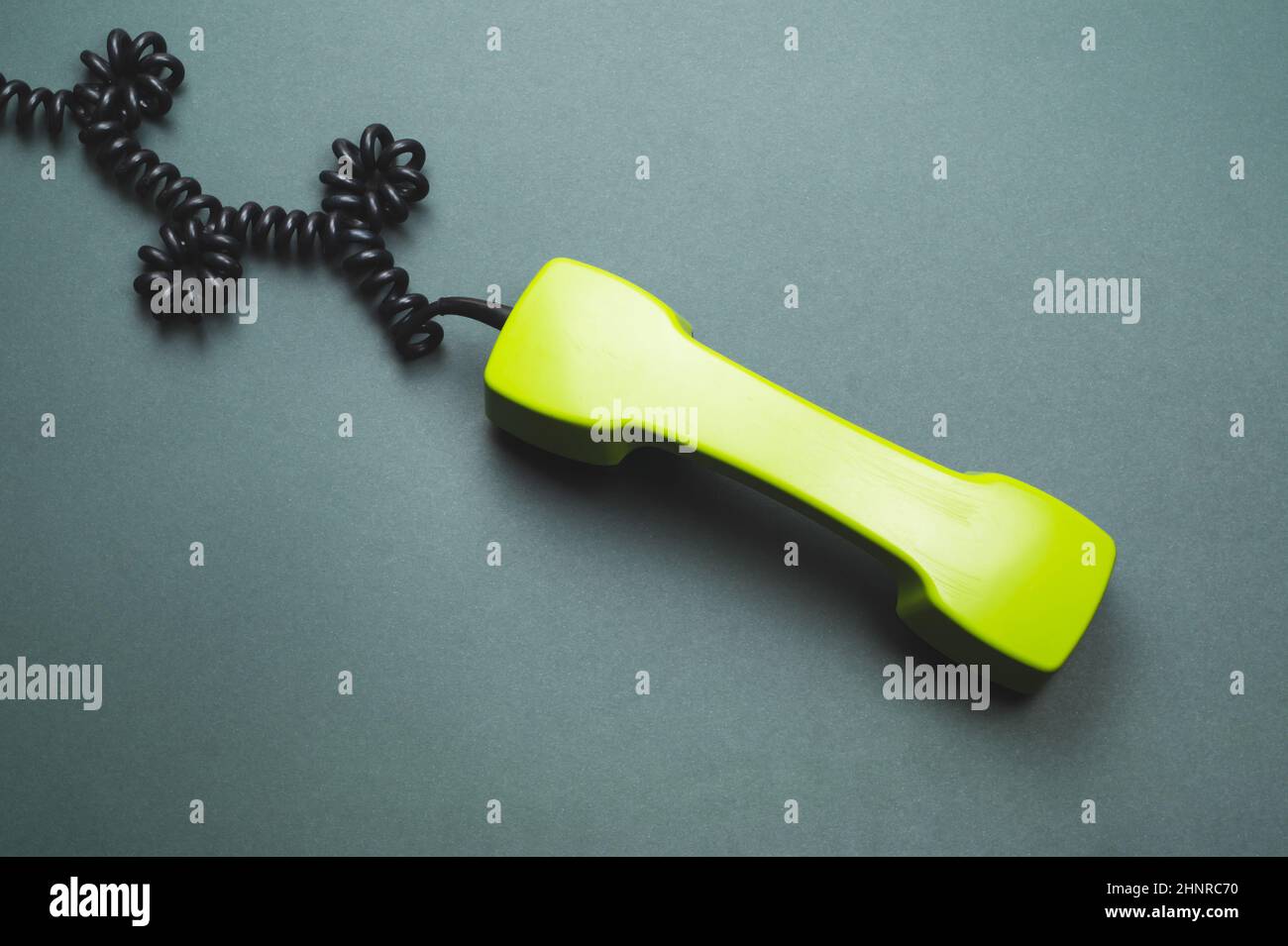 Vintage green telephone handset. phone receiver isolated on color ...