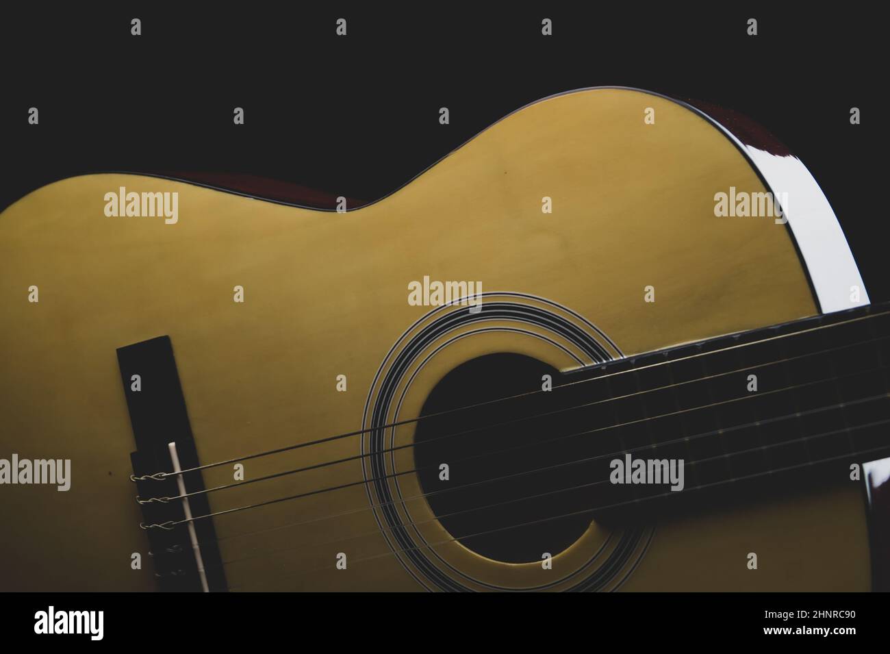 Guitar on the black background. acoustic musical instrument Stock Photo ...