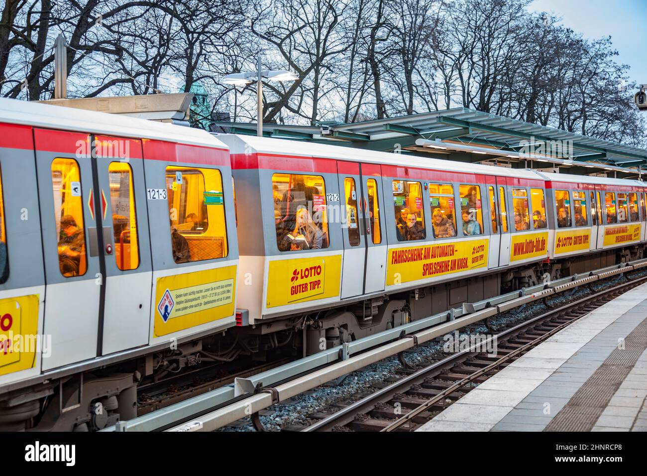 people sit in the train at station Kellinghus and wait for departure in ...