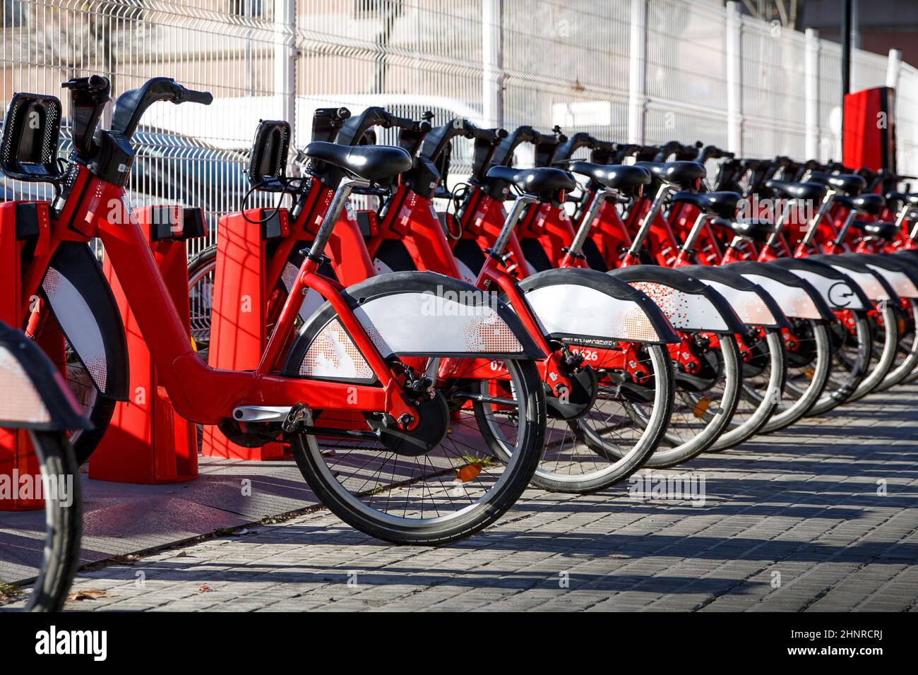 Bike rental station. The row of bicycles is ready for sharing Stock ...