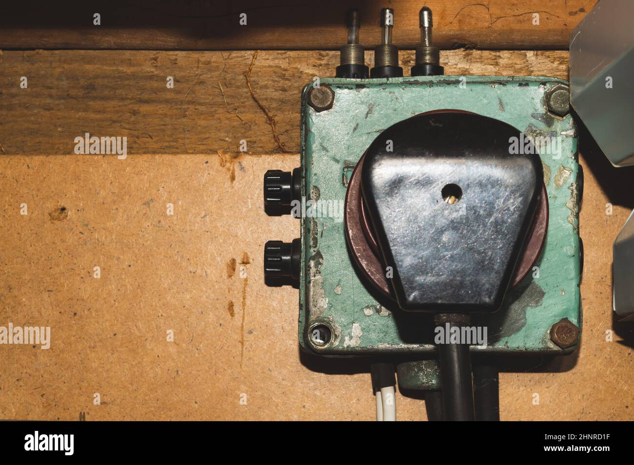 Old power socket in electric power supply box with fuses. industrial ...