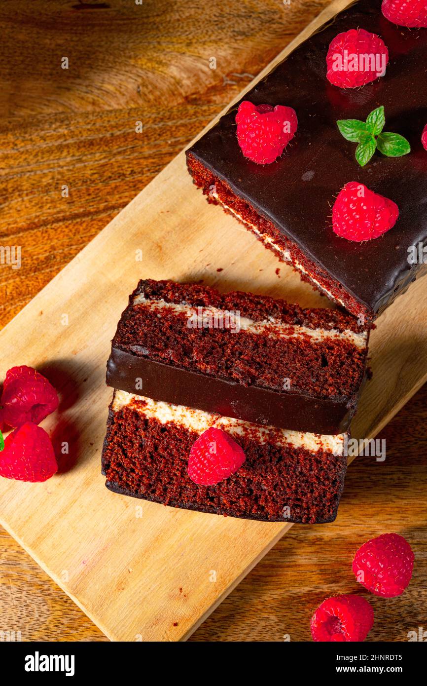 Chocolate cake with raspberries and coffee Stock Photo - Alamy