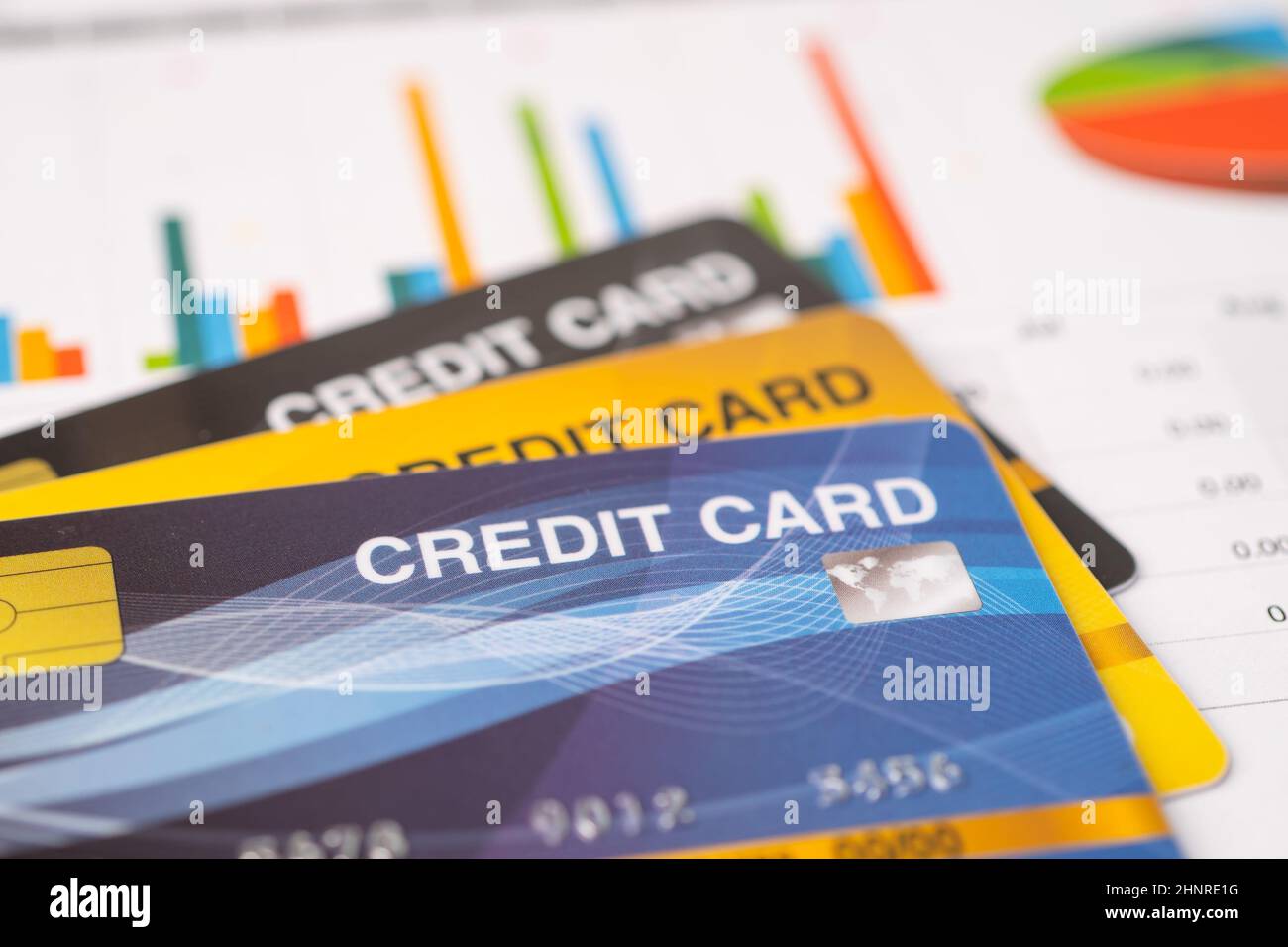 Credit card on chart and graph paper. Finance development, Banking ...