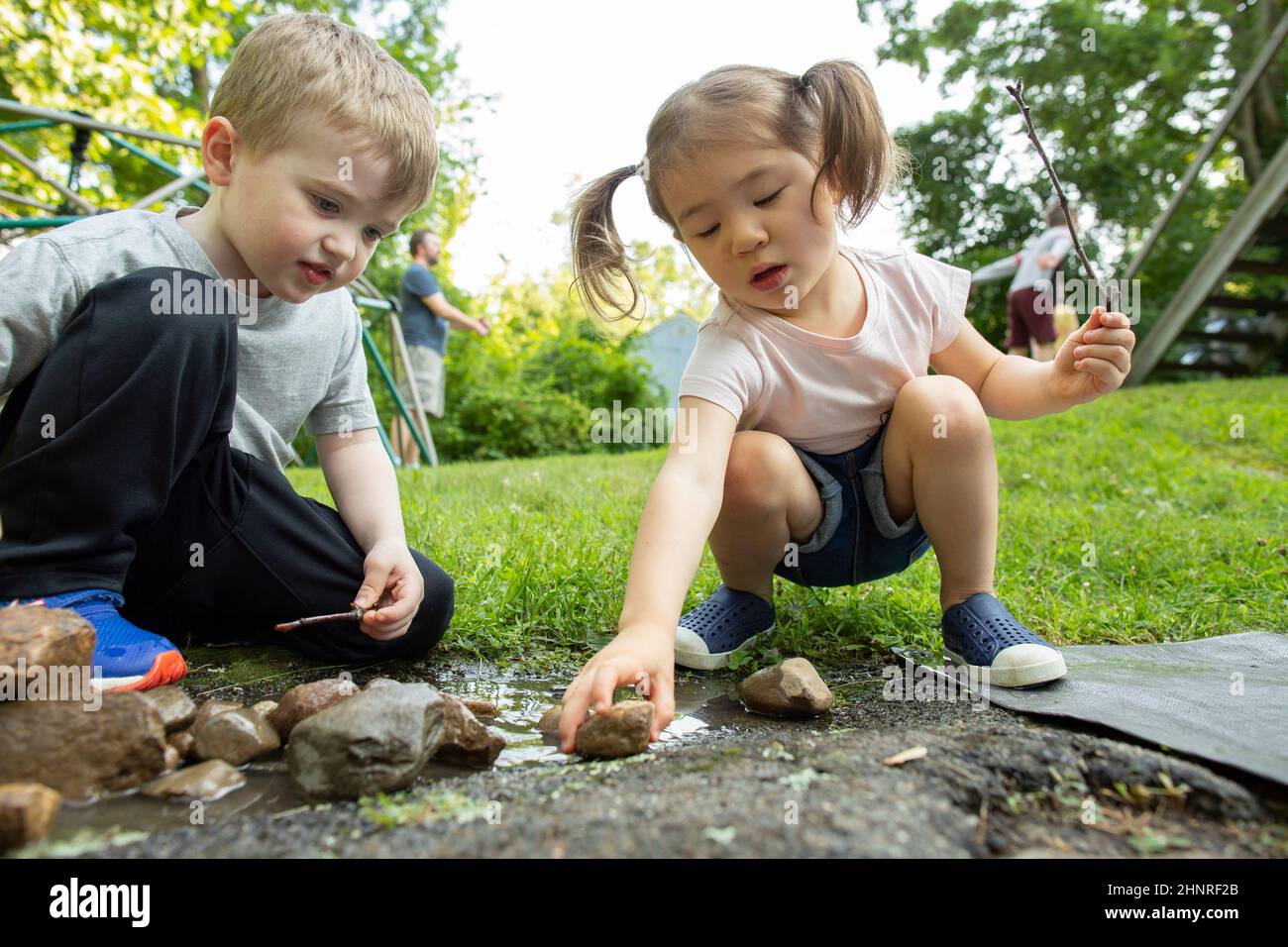 Kids Engaging in Creative Free Play Outdoors in Backyard Stock Photo ...