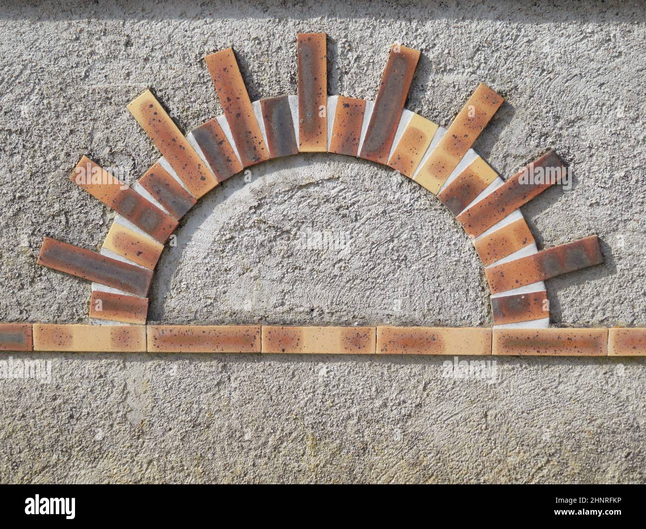 beautiful figure made with sun-shaped bricks colors building materials ...