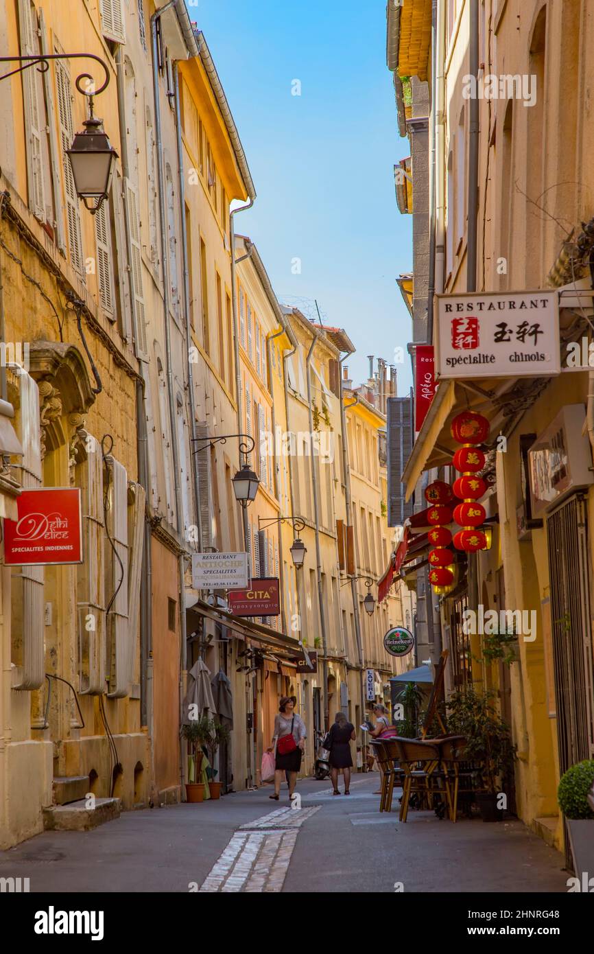 small old streets in the old town of Aix en Provence with typical ...