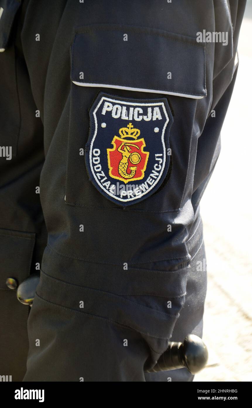 coat of arms of the Polish police on the sleeve of the uniform Stock ...