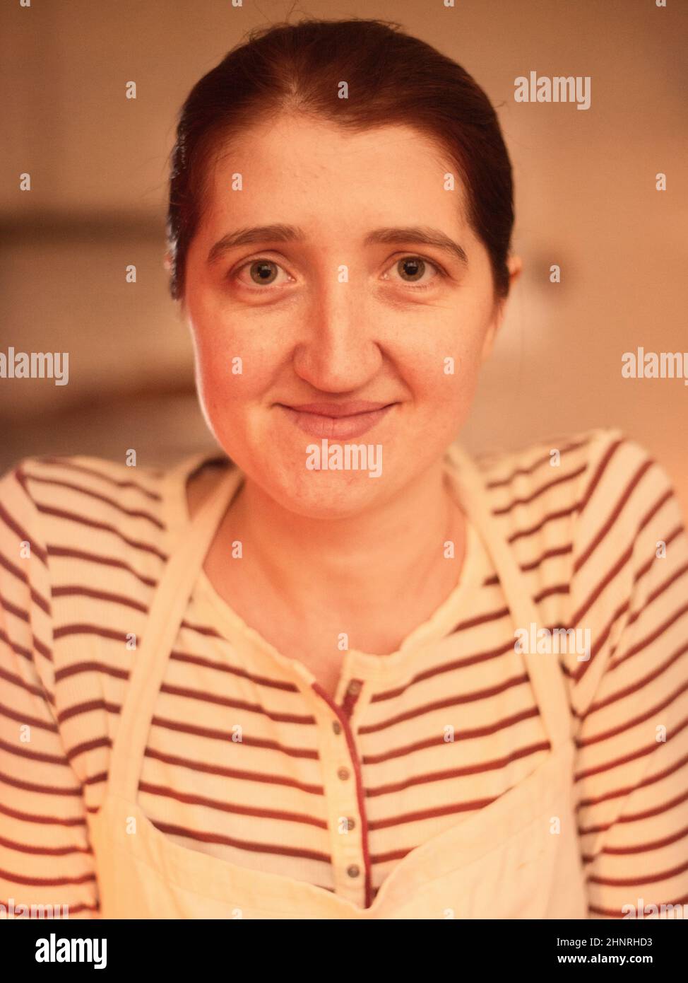 portrait of baker woman in apron Stock Photo - Alamy