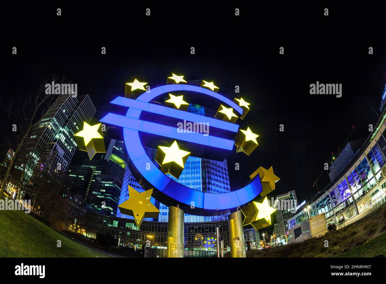 Illuminated buildings and Euro sign at night during Luminale in ...