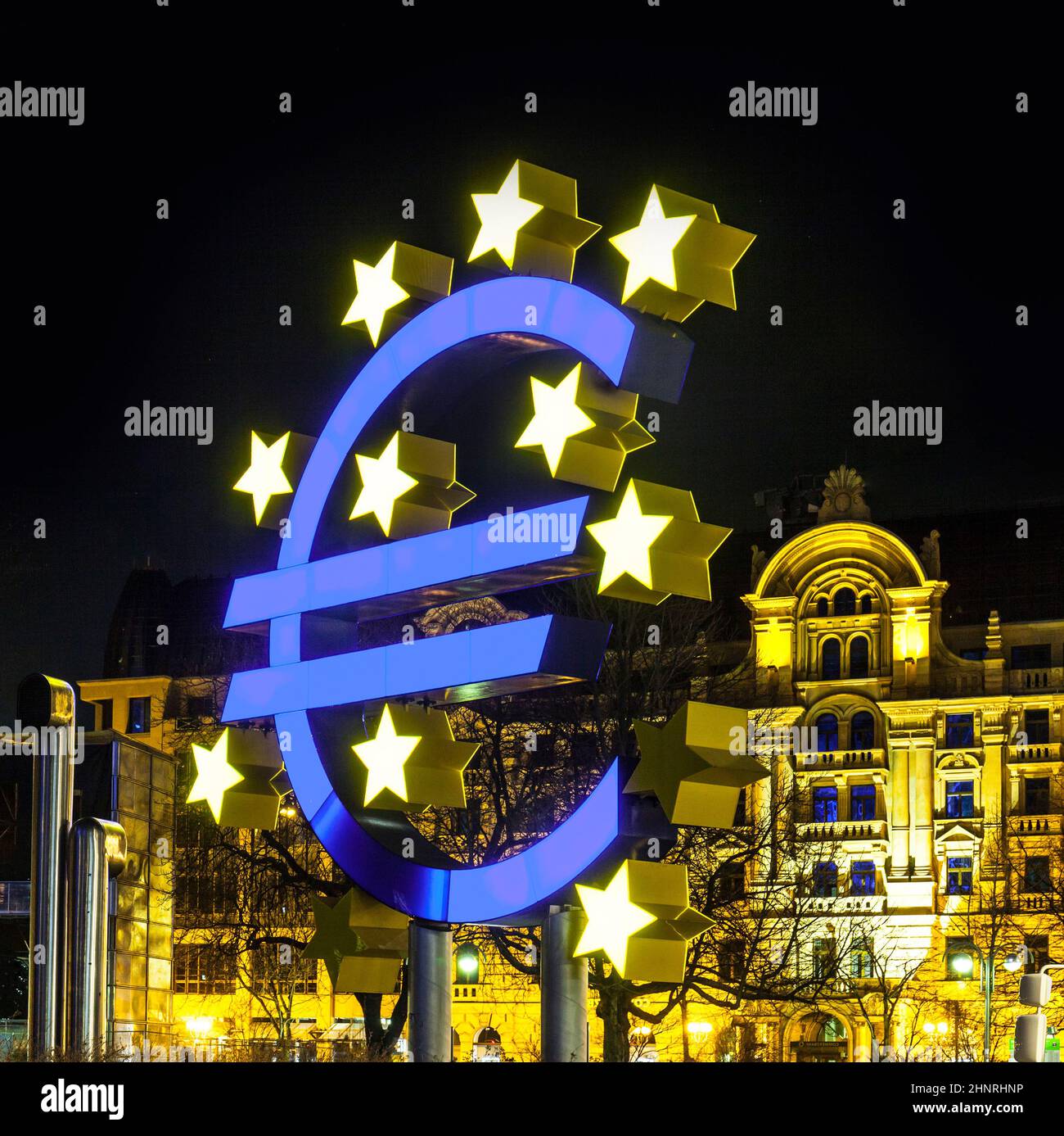Illuminated buildings and Euro sign at night during Luminale in ...