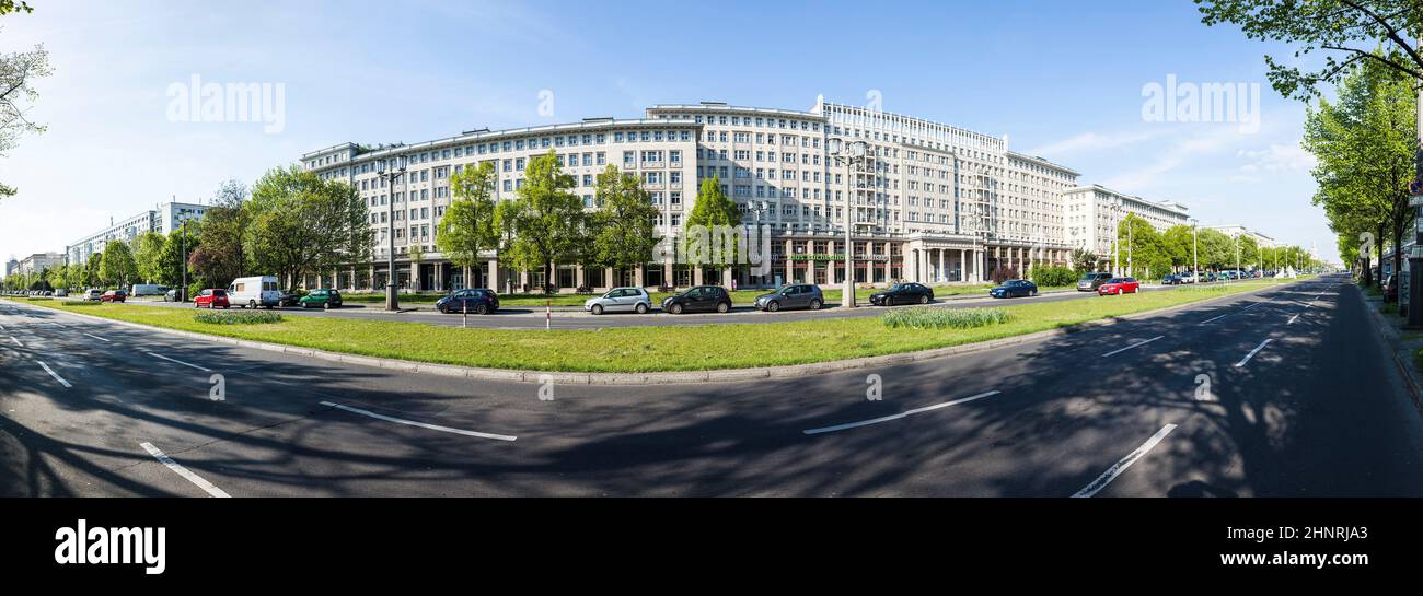 Facades of old socialist GDR era apartment buildings on Karl Marx Allee ...