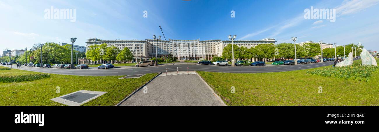 Facades of old socialist GDR era apartment buildings on Karl Marx Allee ...