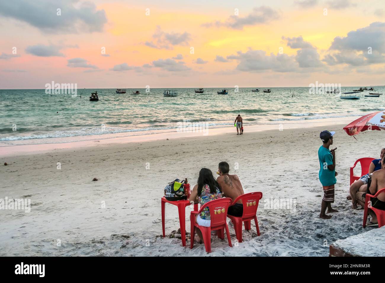 people enjoy the beach at Ponta Preta in the island of Capo verde in ...