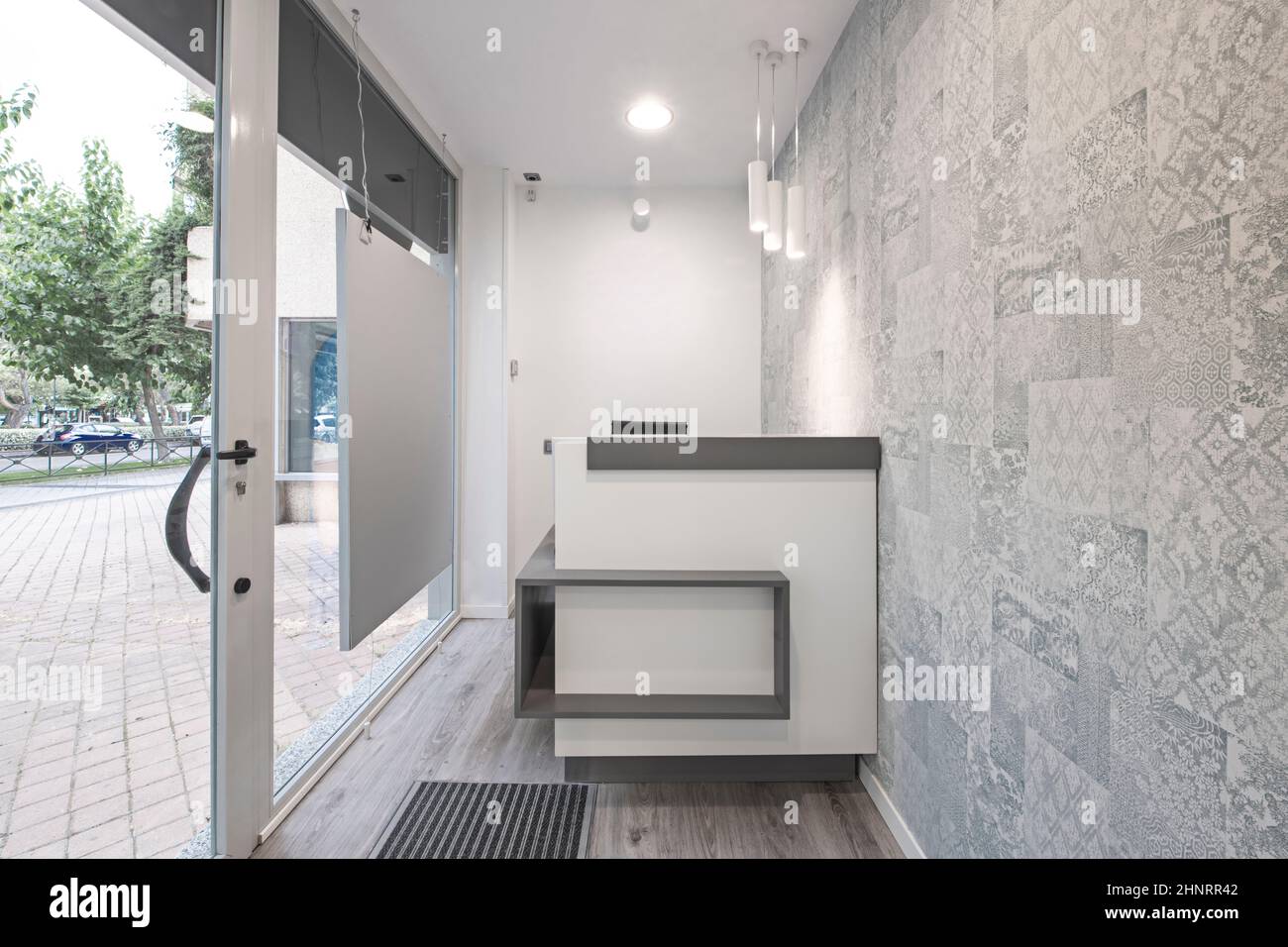 Reception desk in an empty room Stock Photo - Alamy