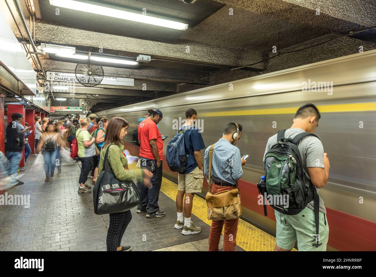 people enter the red line train in the oldest subway in the US Stock ...