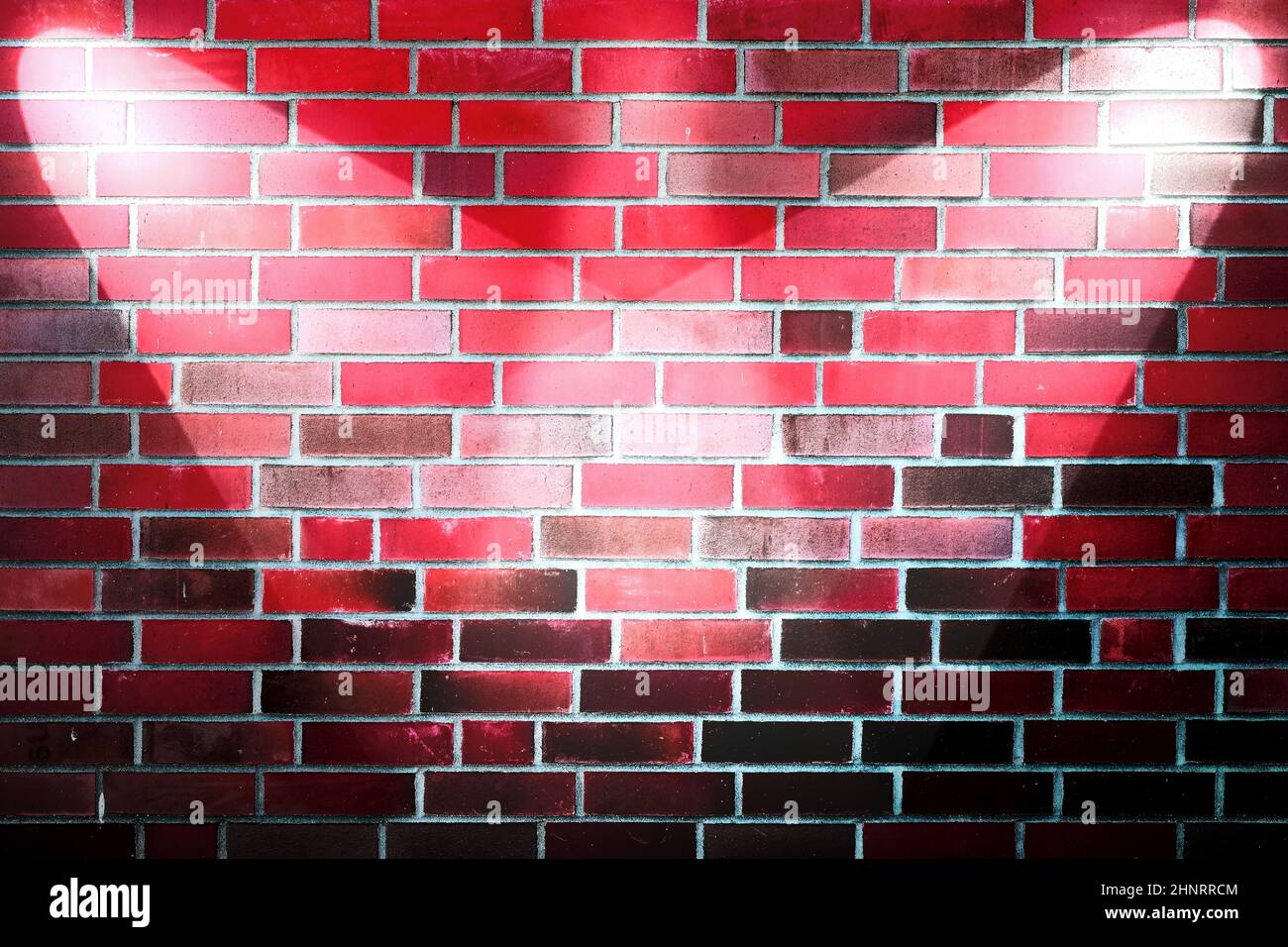 Aged and weathered brick wall textures with bright spotlight ...