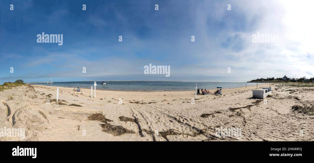 people enjoy the scenic beach at island Cape Cod Stock Photo - Alamy
