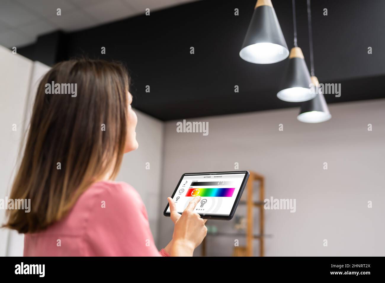 Smart Light Control Using Tablet In House Stock Photo - Alamy