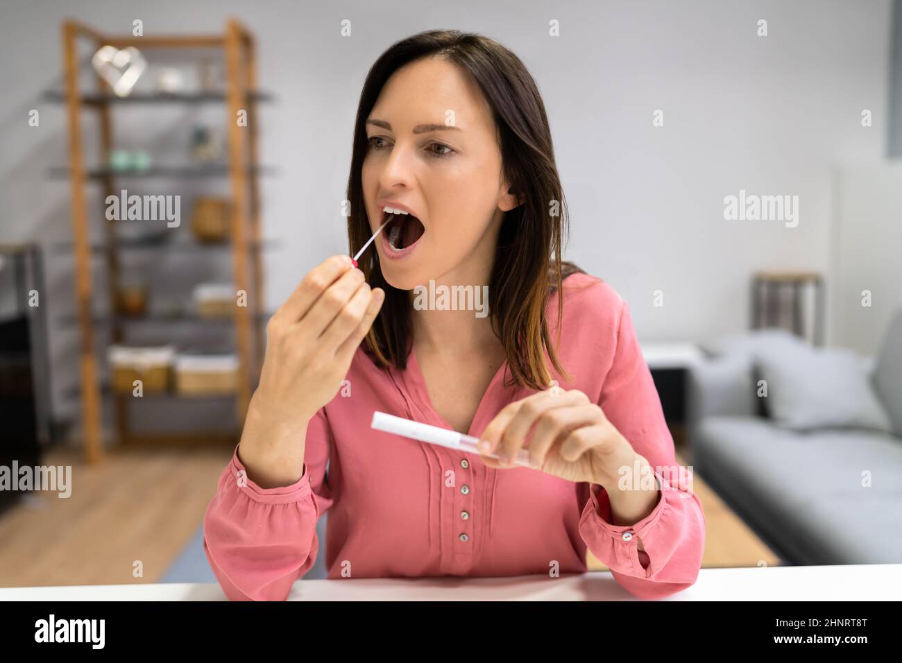 DNA Mouth Saliva Test Swab. Woman Doing Check Stock Photo - Alamy