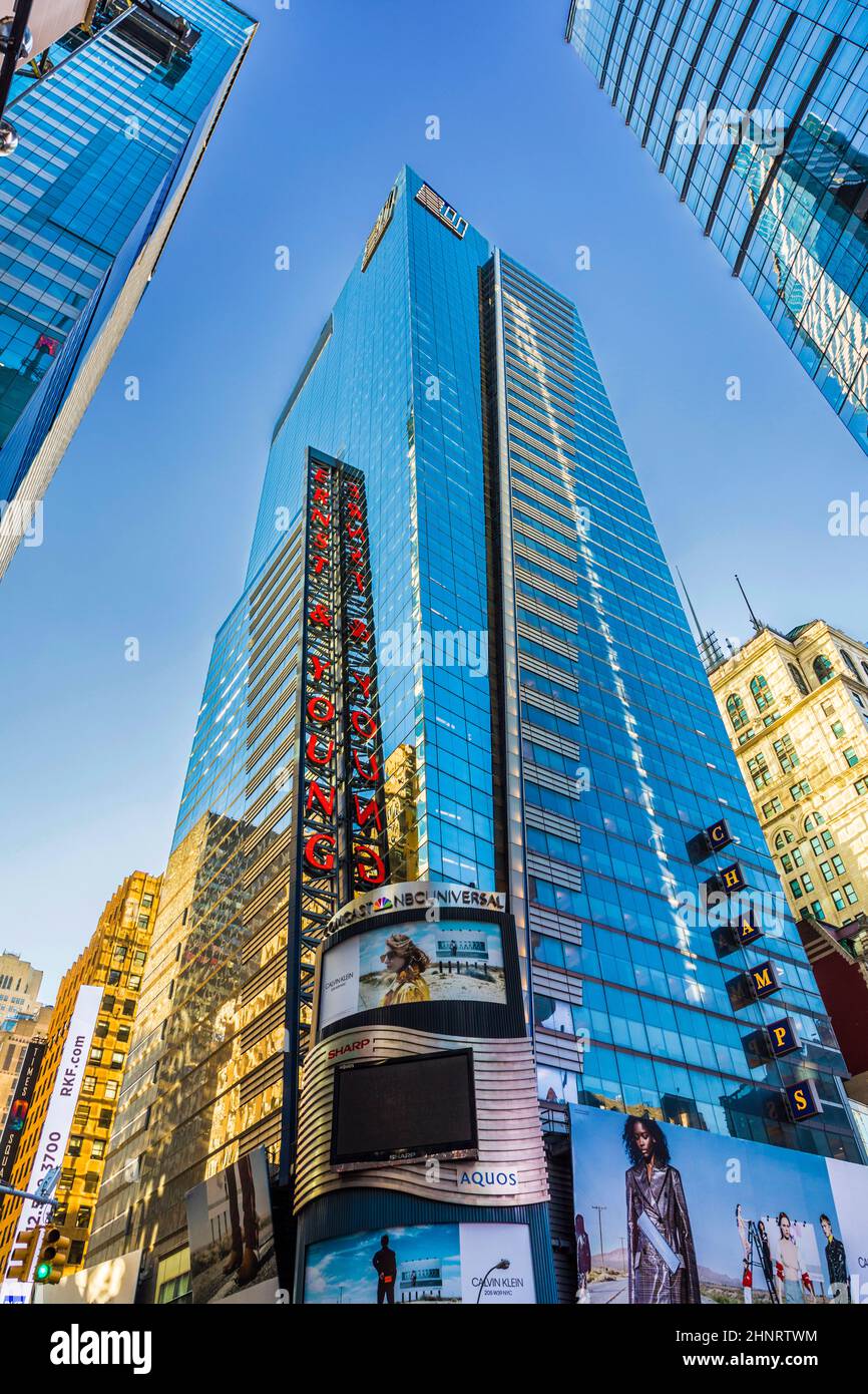 neon advertising of ernst and Young at times square in late afternoon ...