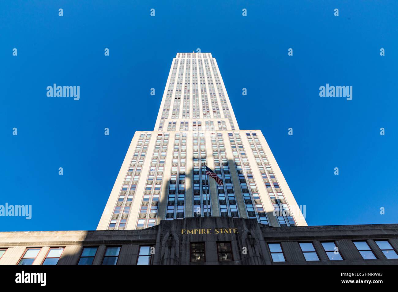 Empire State Building view from street level Stock Photo - Alamy