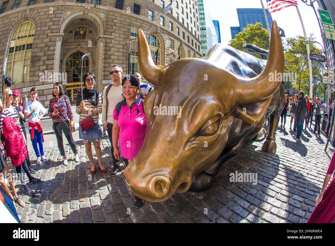 people visit charging Bull in Lower Manhattan in New York City Stock Photo - Alamy