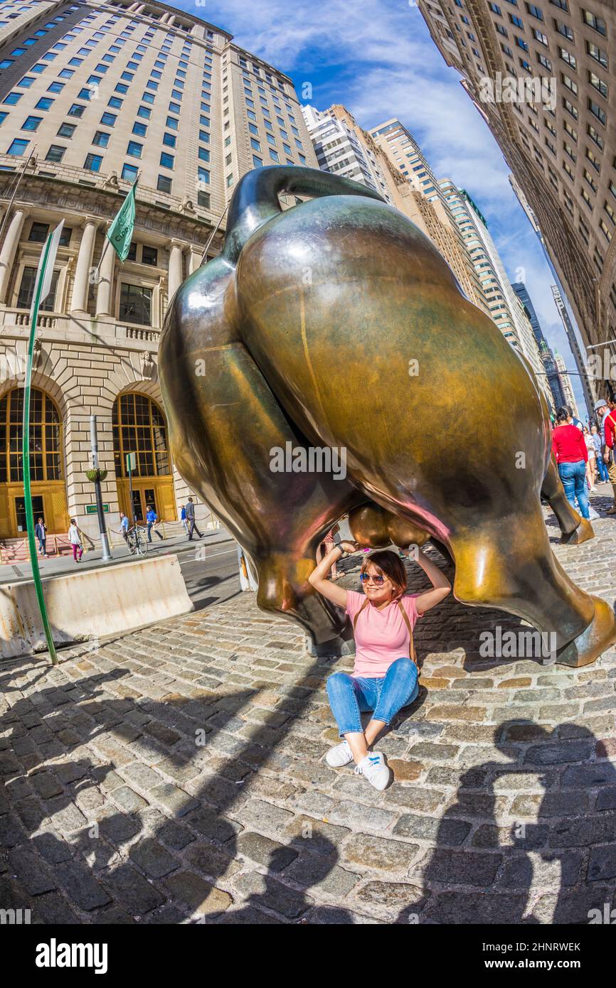 people visit charging Bull in Lower Manhattan in New York City Stock Photo - Alamy