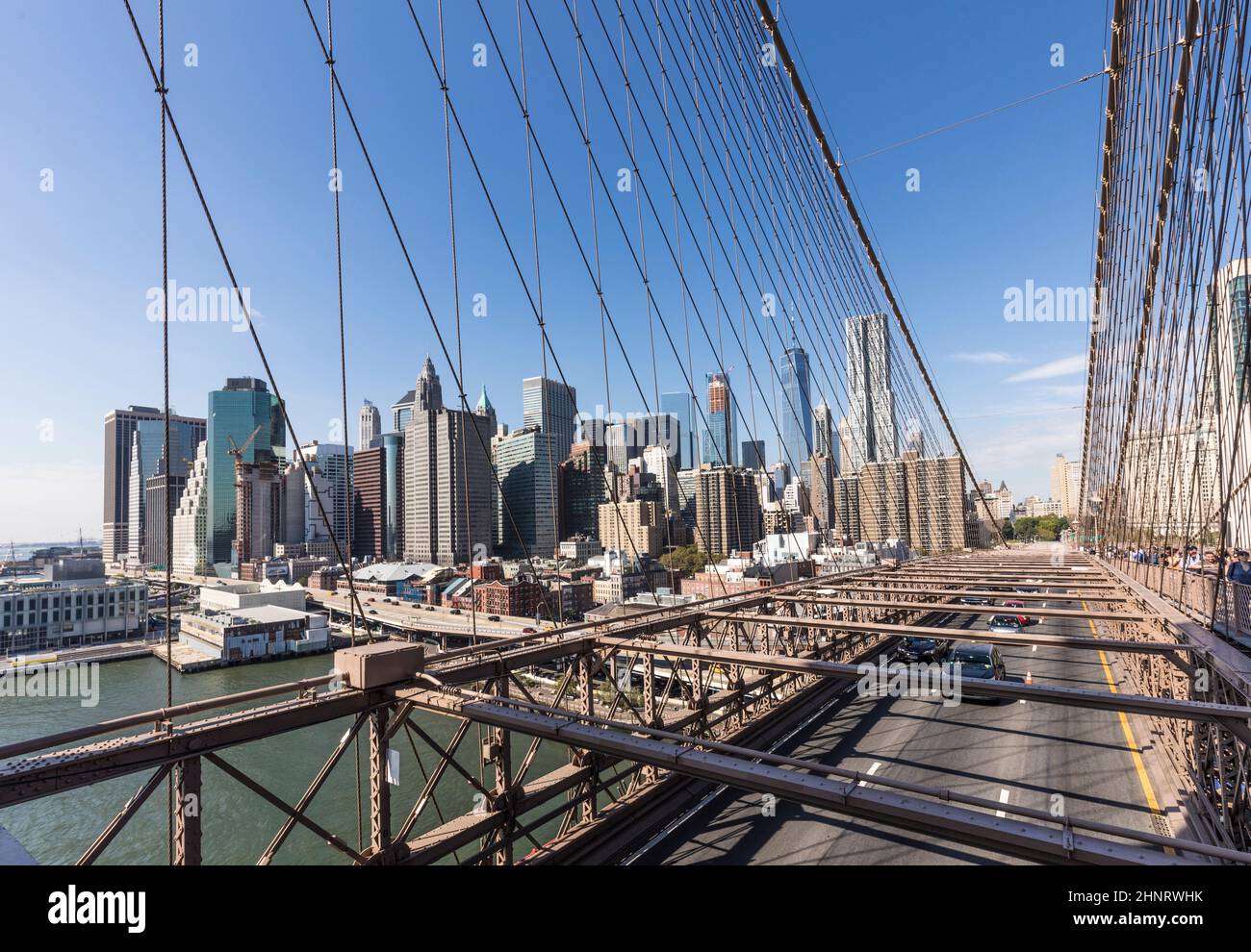 people cross famous Brooklyn Bridge in New York Stock Photo - Alamy