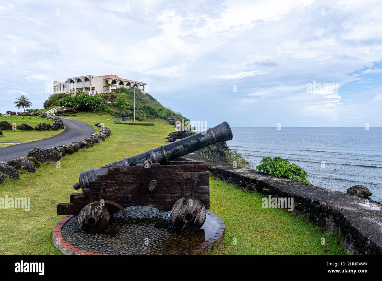 Old cannons pointing to the sea in Guam Stock Photo - Alamy
