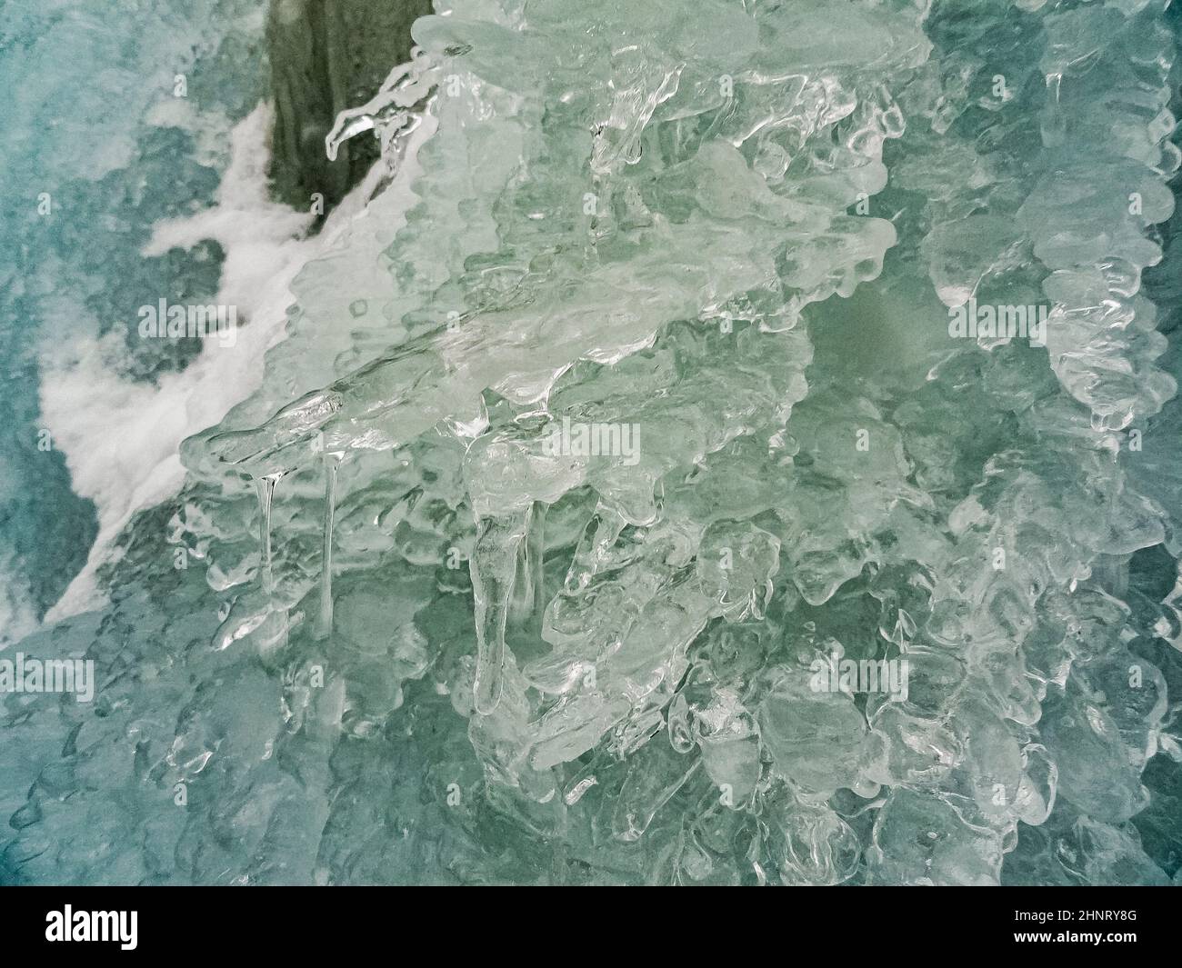 Texture macro shot of a turquoise blue frozen waterfall in Norway Stock ...