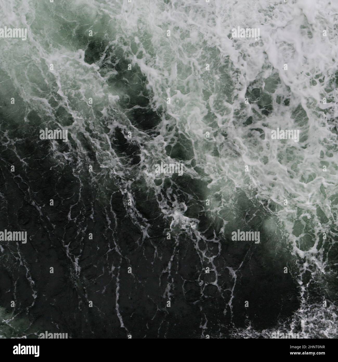 Big water splash seen from above a boat Stock Photo - Alamy