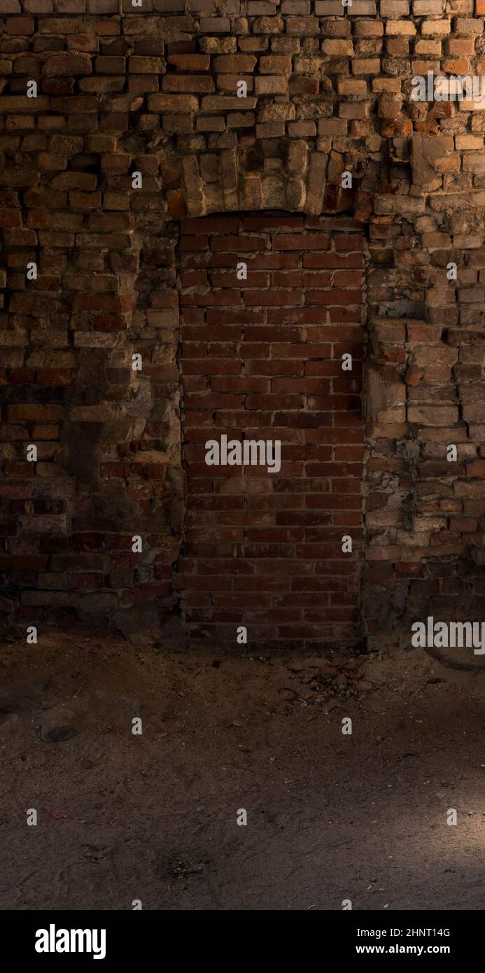 old wall made from bricks with bricekd up door Stock Photo - Alamy