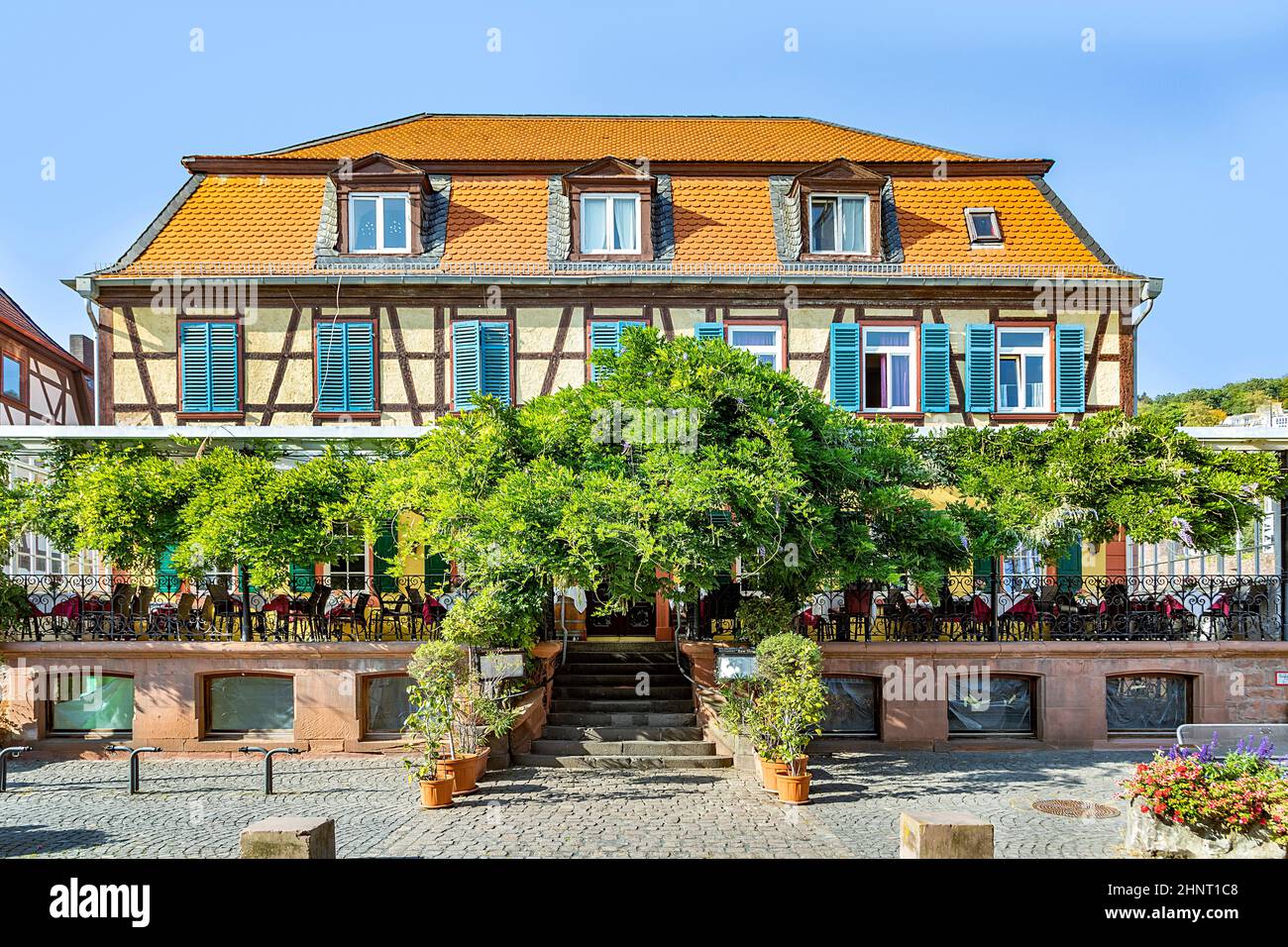 view to old half timbered historic restaurant in Buedingen with empty ...