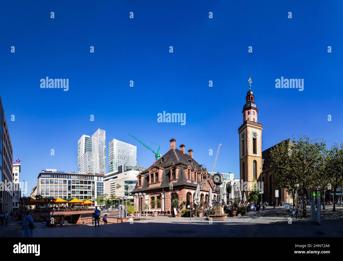 people enjoy the sunny day in Frankfurt, Germany in cafe Hauptwache ...