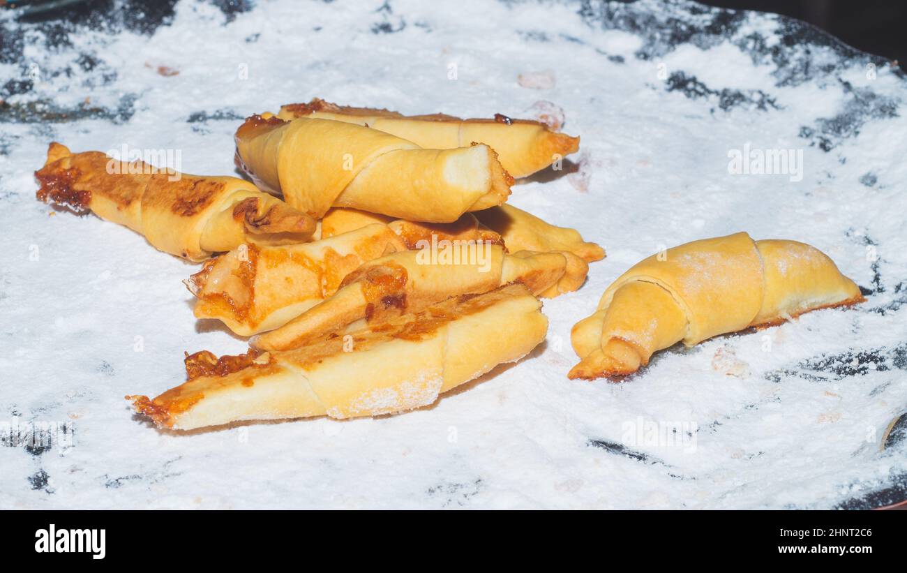 Crispy croissants stuffed with jam. traditional slavic pastry called ...